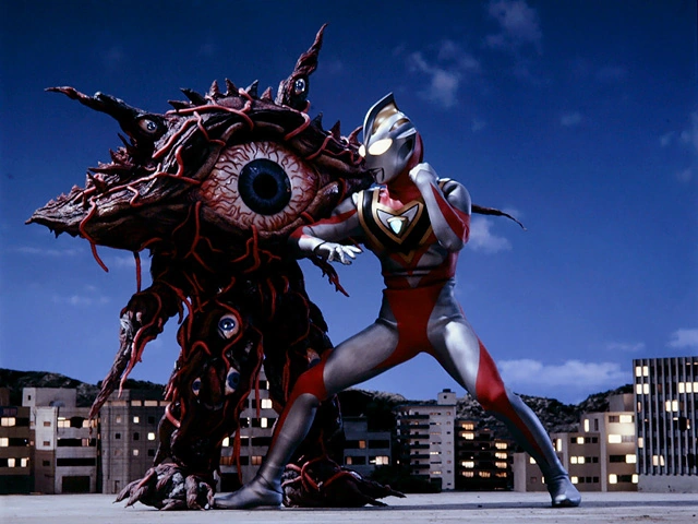 Image - Gan-Q 02 v Ultraman Gaia.png - Ultraman Wiki